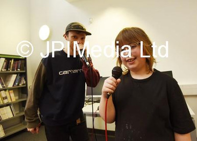 39409797-WIGAN - 12-04-22 Chris Maylor beatboxer Renegrade, left, holds ...