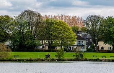 39707654-Members of the public walking around Yeadon Tarn, near Leeds ...
