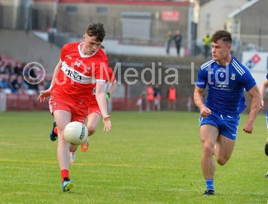 39047370-Sean Kearney Derry, sees off a challenge from Monaghanâ€™s ...