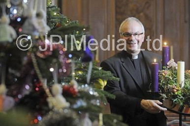 38390654-Vicar Fr David Lyon at a previous Christmas tree festival at ...