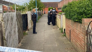 39718130-Police and scene of crime officers at a incident at Spurn Walk ...