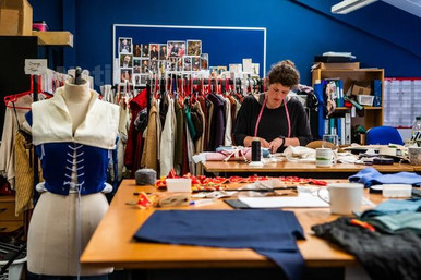 39718971-Staff and volunters preparing costumes at the York Theatre ...