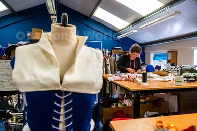 39718969-Staff and volunters preparing costumes at the York Theatre ...