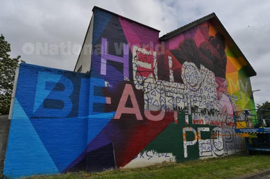 39719258-City street artist Nathan Murdoch at work at Gladstone Street ...