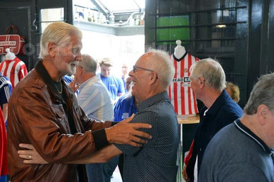 39733079-SAFC footballer John Tones is welcomed by friends as he ...