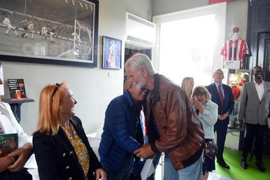 39733077-SAFC footballer John Tones is welcomed by friends as he ...