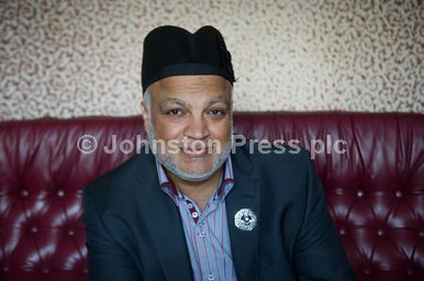 31164778-John Devlin. 24 07 15 . GLASGOW. Portrait of Habib Malik with ...