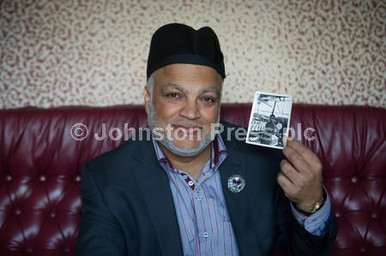 31164884-John Devlin. 24 07 15 . GLASGOW. Portrait of Habib Malik with ...