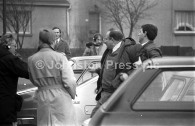 20377835-An angry miner is restrained by a colleague outside Bilston ...