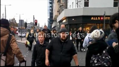 29545646-Video grabs of Nash Riggins crossing Princes Street and ...