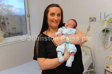 23450737-The first baby born in Scotland in 2013. Riley Harkness with ...