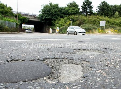 25067226-Photograph by Ian Georgeson, Pot hole, Western Approach Road ...