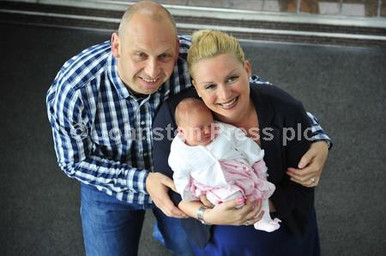 24773688-Baby Eva with her parents Susan and David Dempsey from Newton ...