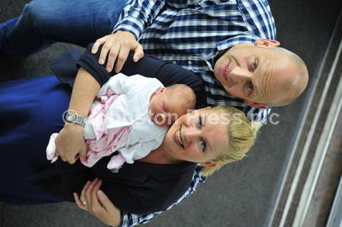 24773690-Baby Eva with her parents Susan and David Dempsey from Newton ...