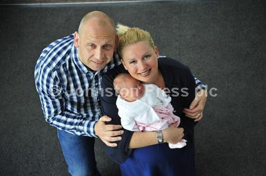 24773693-Baby Eva with her parents Susan and David Dempsey from Newton ...