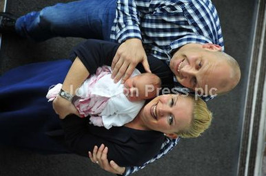 24773695-Baby Eva with her parents Susan and David Dempsey from Newton ...