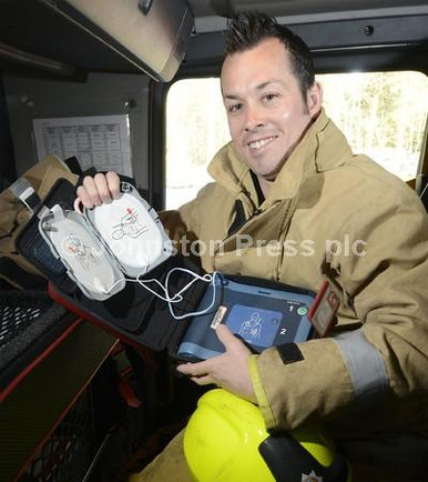 30191798-Dakeith Fire Station, Firefighter David Dickson with a ...