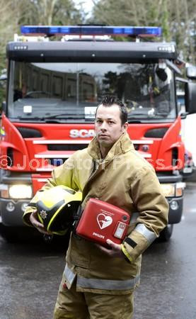 30191797-Dakeith Fire Station, Firefighter David Dickson with a ...