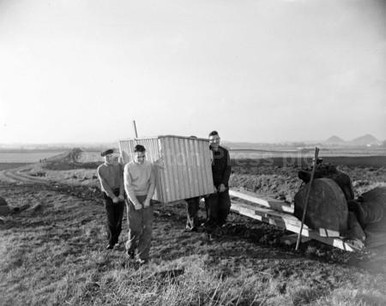 20003757-Workmen bring in their gear before building starts at BMC s ...