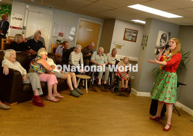 39840941-Entertainer Keeley May performed songs for residents during ...