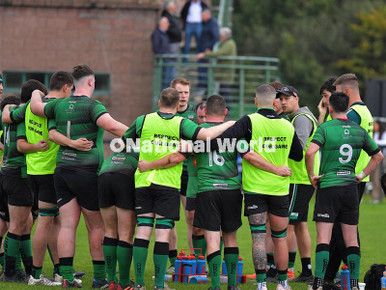 39872143-City of Derry head coach Richard McCarter speaks to his ...