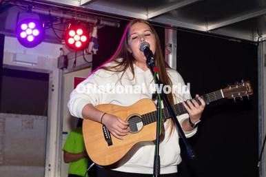 39872226-A singer performs before the Memory Walk on Blackpool ...