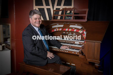 39884582-Organist Kevin Grunill with the Allen 317ex digital theatre ...