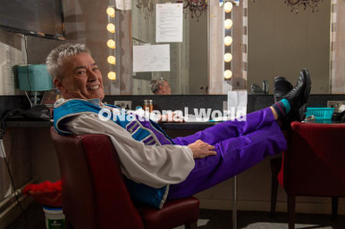 39904390-Billy Pearce relaxing in his dressing room at the Alhambra ...
