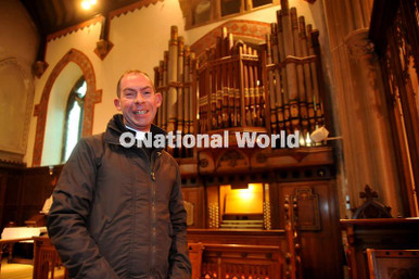 39910540-Father David at St John's Church, Burgess Hill. The church ...
