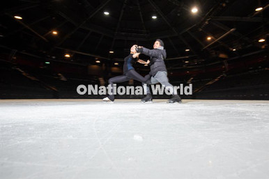 39916454-Ice skating coach Oscar Peter with student Miranda Green in ...