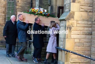 39928294-Pall bearers carry the coffin of Mandy Laird-Hall, who taught ...