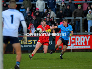 39936401-Cormac Murphy of Derry shields the ball from Dublinâ€™s Cian ...