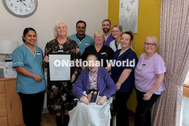 39959018-Edith Gallagher celebrates her 100th birthday with staff from ...
