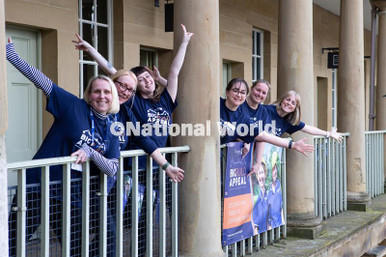 39960005-Team from Overgate Hospice showing plans and fundraising for ...