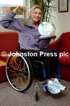 37572011-Shelly Woods with her marathon medals at Progress House in ...