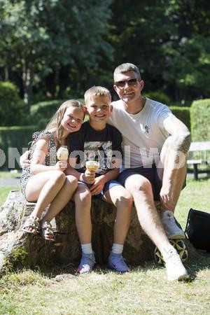 39514219-People enjoy the sunny weather at Manor Heath Park. From the ...
