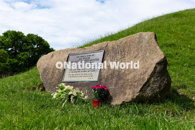 39973663-Flowers have been laid at the memorial to the victims of the ...