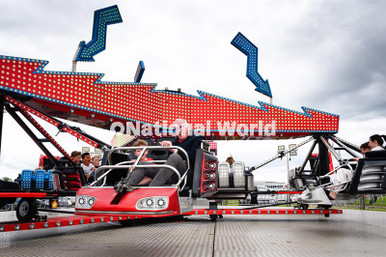 39983851-Pictured is: Enjoying one of the funfair rides Picture: Keith ...