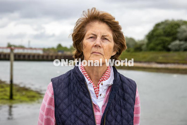 39998058-Libby Alexander of Save Our South Coast Alliance, highlighting ...