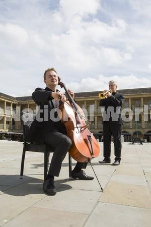 39444329-Piece Hall Proms, Halifax. Conductor Ben Crick playing the ...