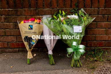 40009232-Floral tributes left close to the police cordon for the fatal ...