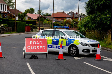 40009231-Police cordon near scene of a fatal crash where six people ...