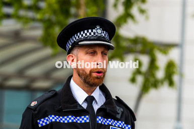 40009240-Supt Alan Travis, from West Yorkshire Police, talking to the ...