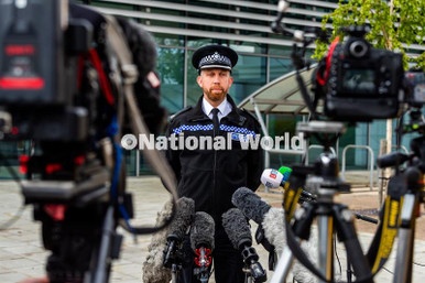 40009237-Supt Alan Travis, from West Yorkshire Police, talking to the ...