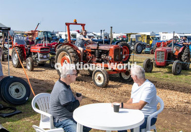 40015625-Visitors watch on as the tractors parade to the main ring at ...