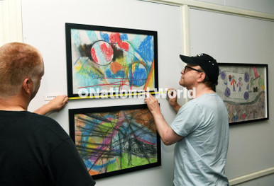40018586-Artists from Artworks Sheffield installing a new exhibition ...
