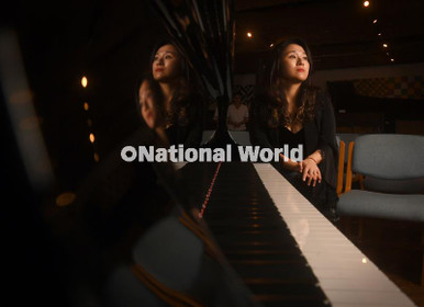 40022248-Pianist Li Can is flying a contingent of eight young Chinese ...