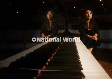 40022250-Pianist Li Can is flying a contingent of eight young Chinese ...