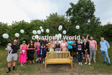 40022399-Balloons are about to be released. Family and friends of Ian ...
