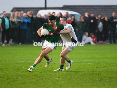 40029769-Craigbane’s Jude McLaughlin grapples with Corin McMonagle of ...